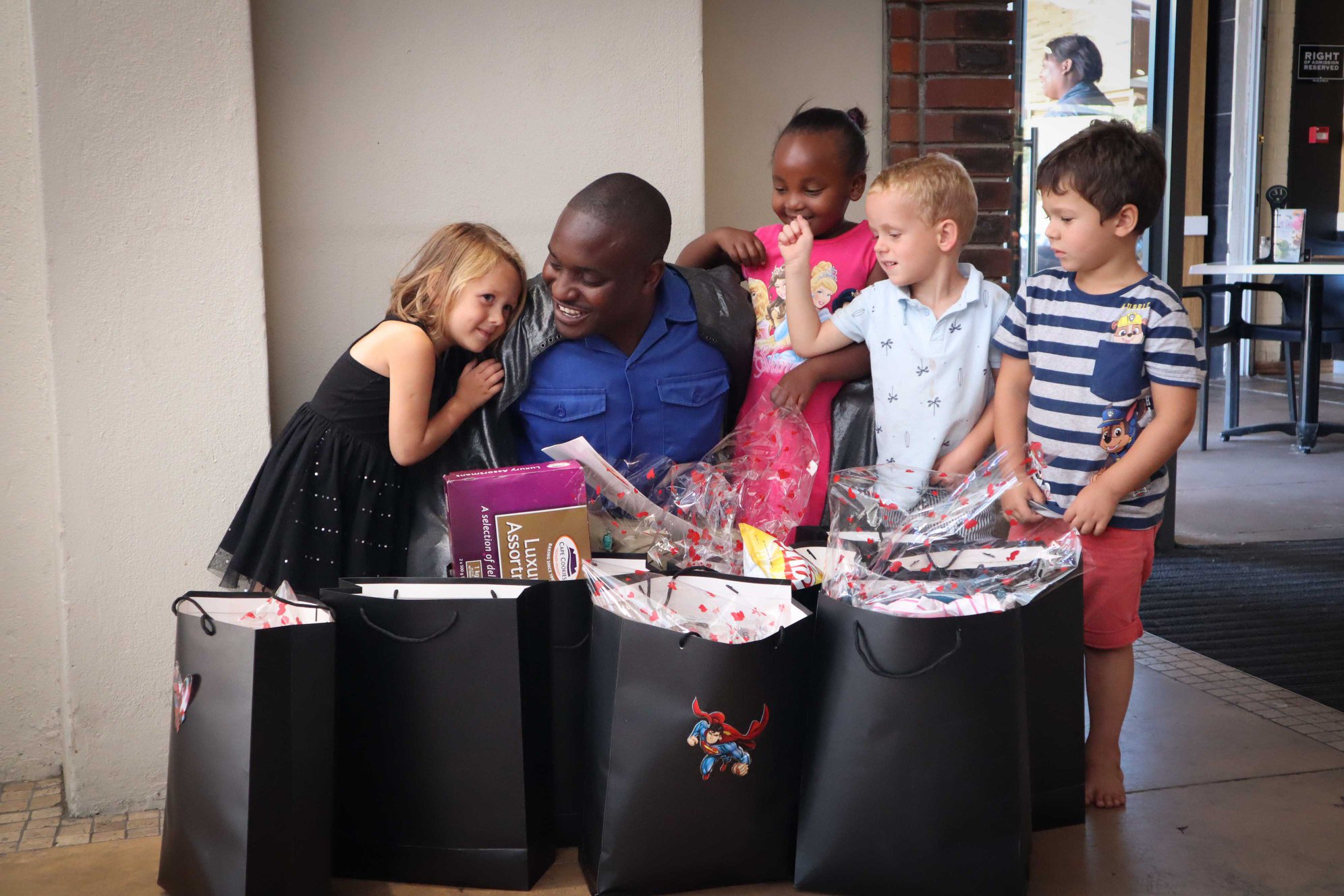 Heroic security guard honoured for saving child's life outside shopping ...