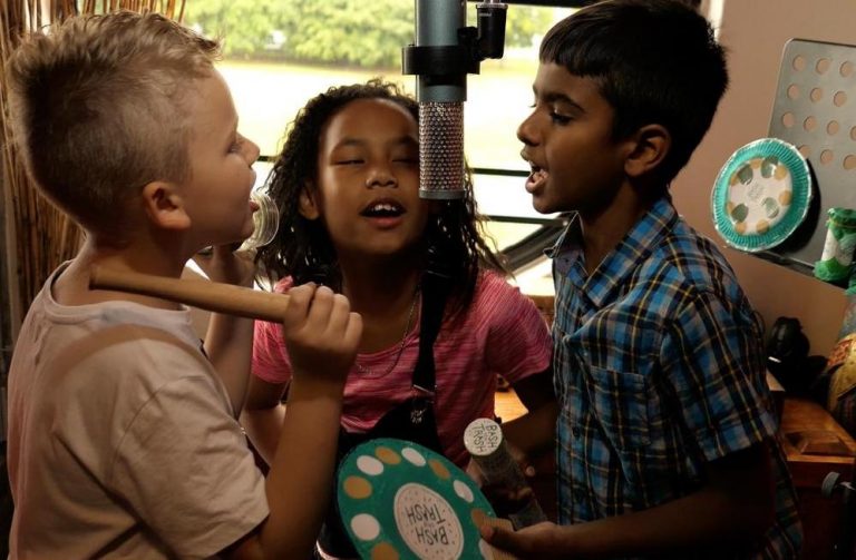 Children explore their musical sides by making instruments out of recycling