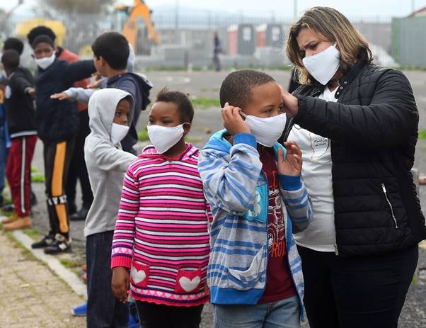 Hotels transform sheets into masks, to support community members